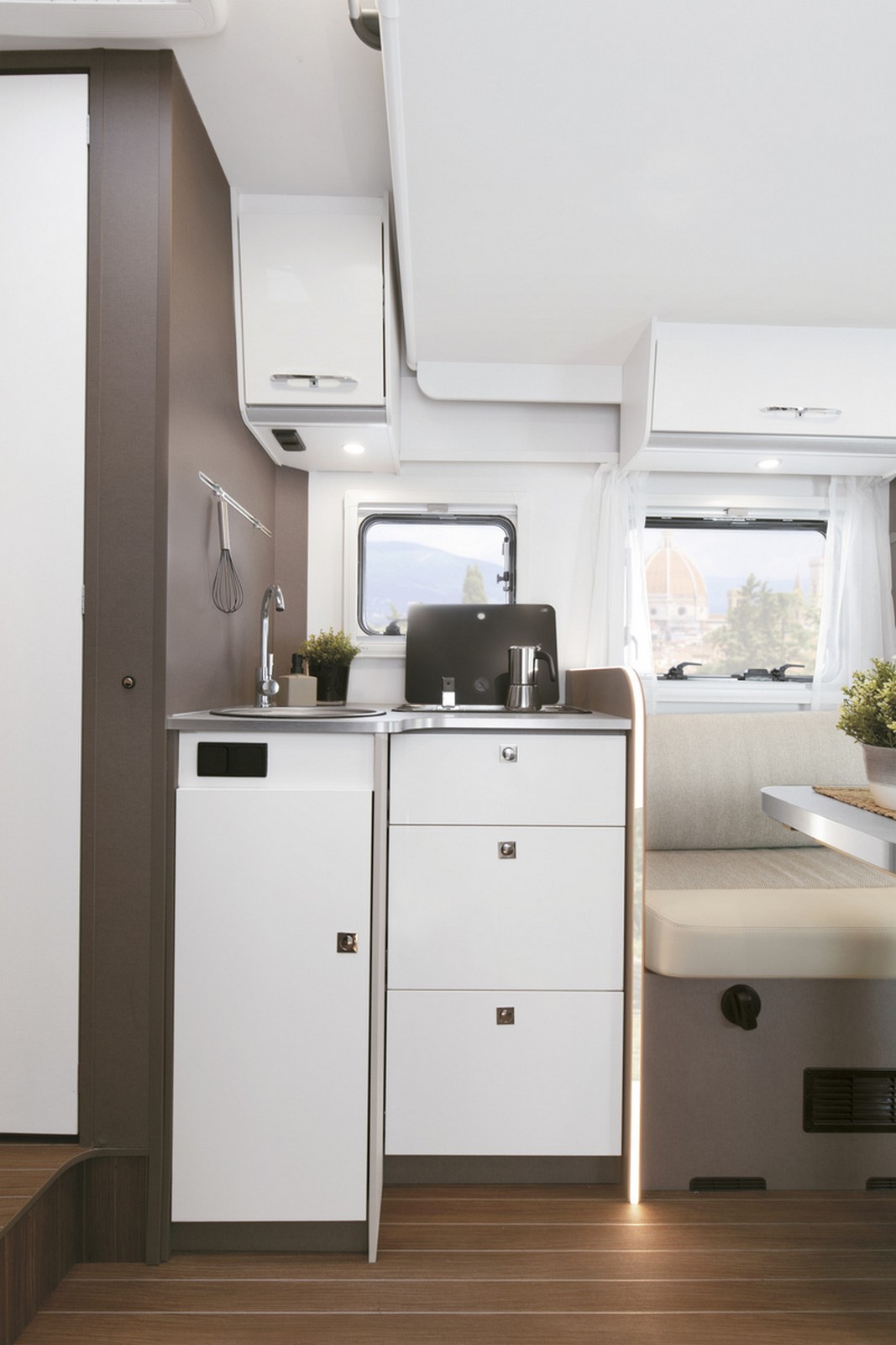 Hire a two berth motorhome with Justgo. Rainbow motorhome for two people.