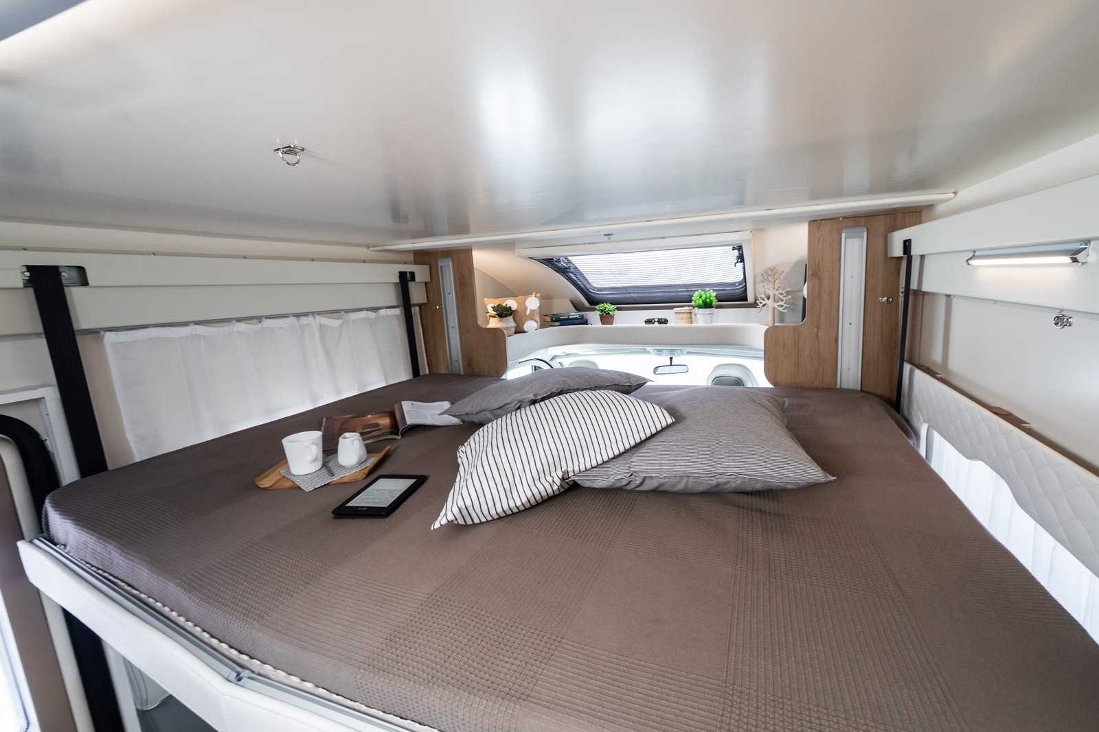 Hire a two berth motorhome with Justgo. Rainbow motorhome for two people.