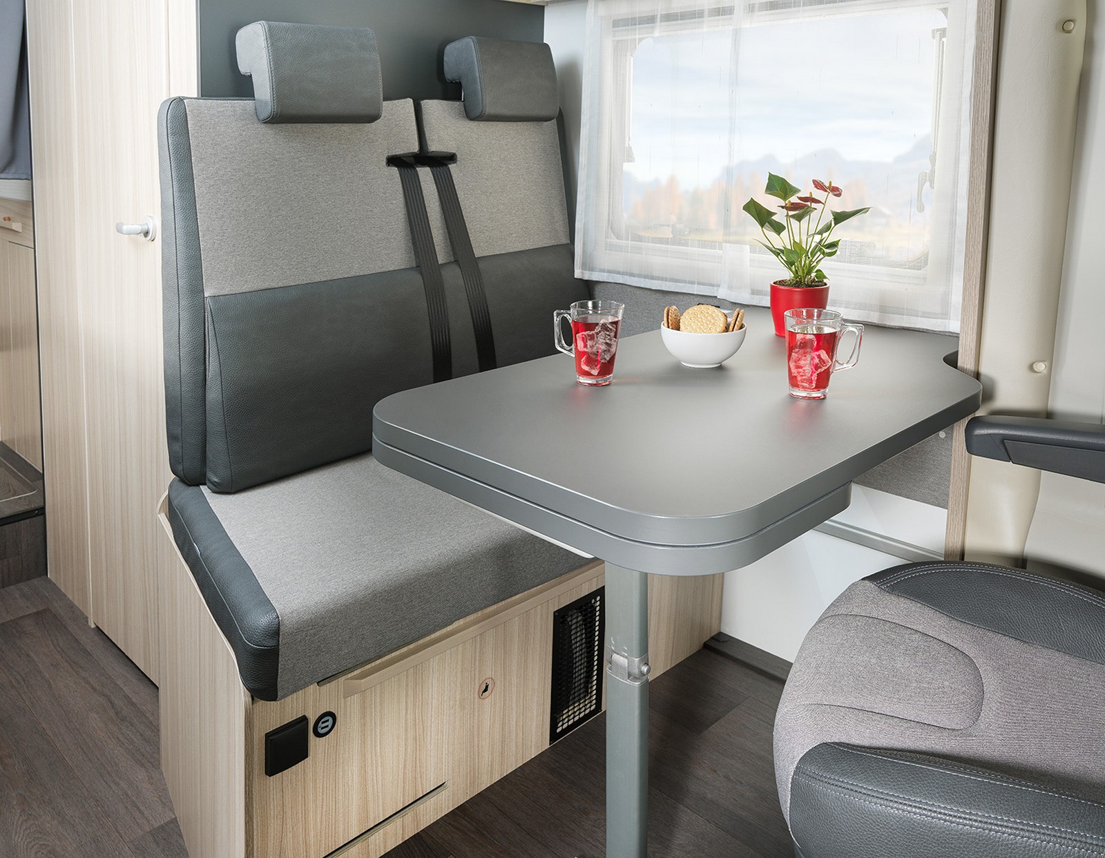 Hire a two berth motorhome with Justgo. Rainbow motorhome for two people.