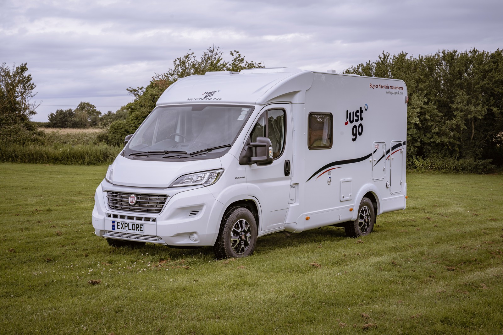 Hire a two berth motorhome with Justgo. Rainbow motorhome for two people.