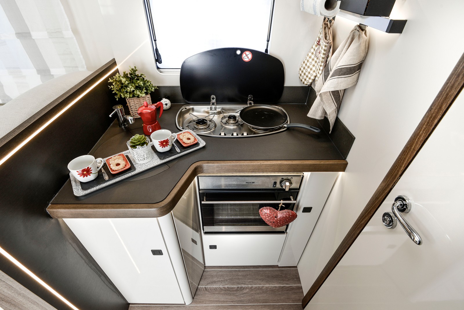 Hire a two berth motorhome with Justgo. Rainbow motorhome for two people.