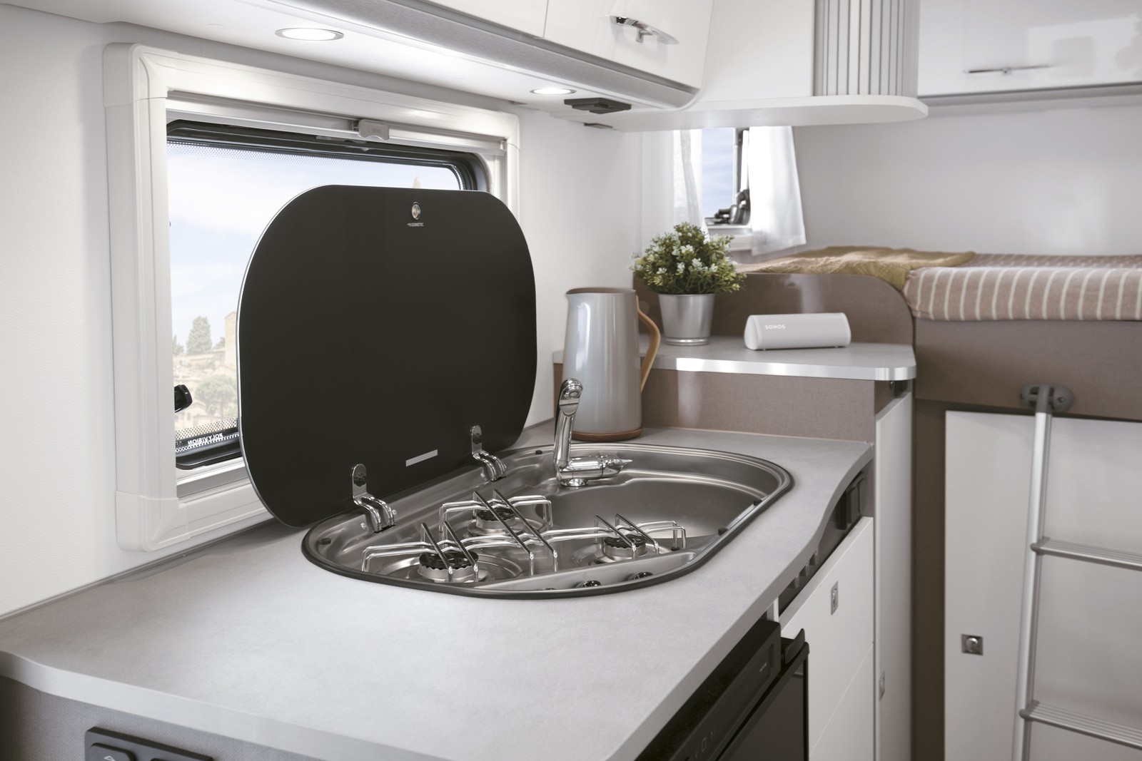 Hire a two berth motorhome with Justgo. Rainbow motorhome for two people.